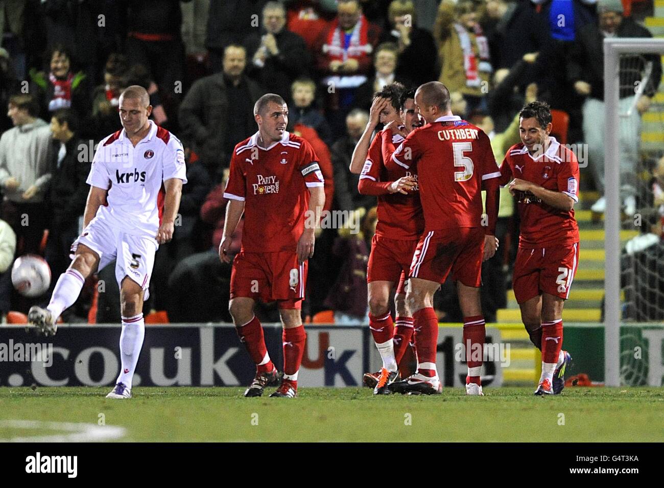 Leyton Orient's Matthew Spring (centre) is congratulated on scoring ...