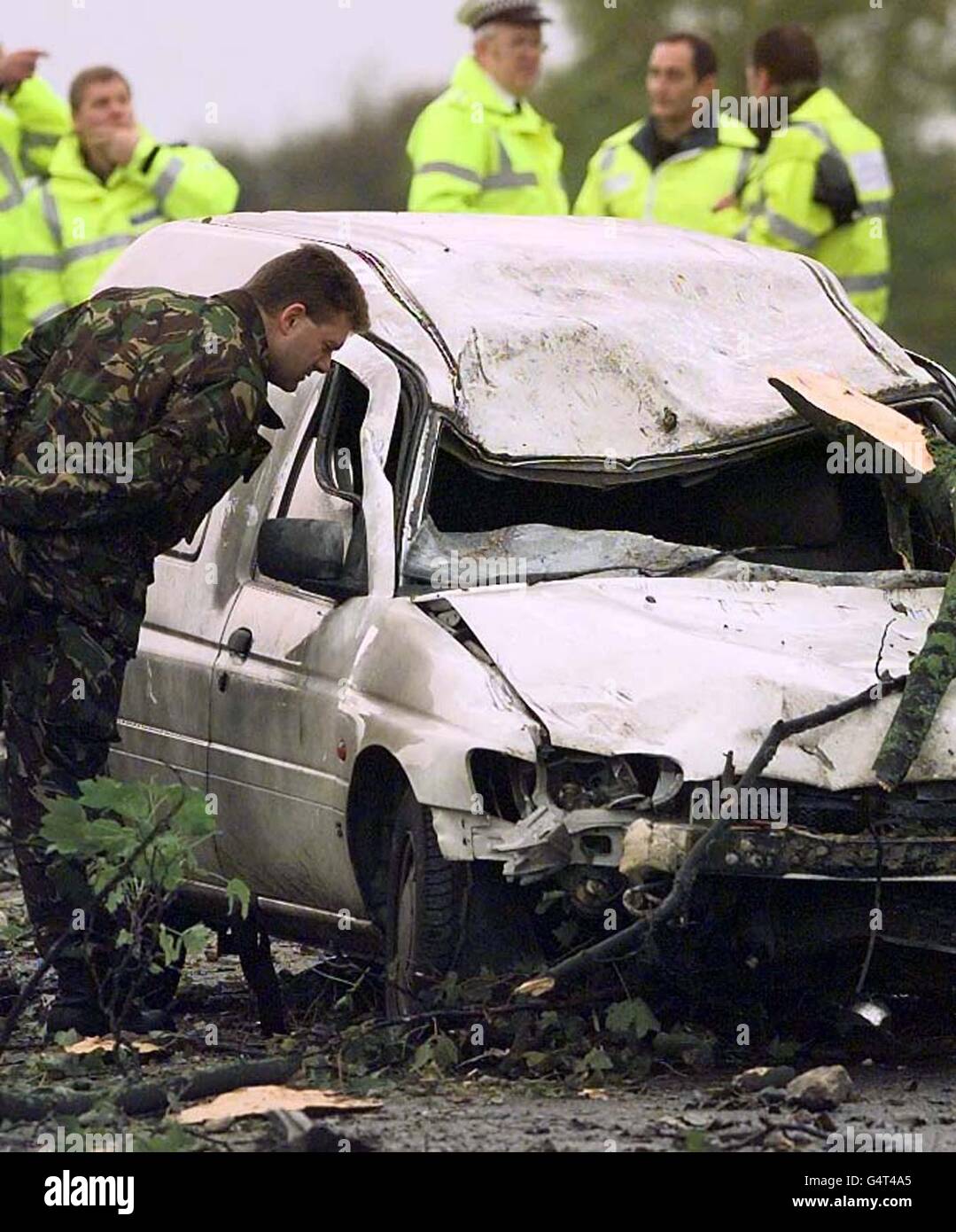The RAF, Police and Air Safety experts examine the wreckage of a RAF ...