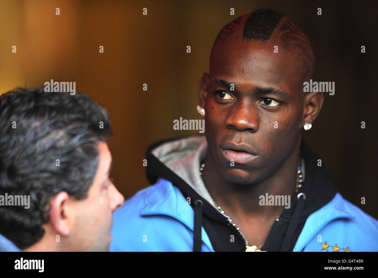 Manchester citys mario balotelli is seen in the tunnel hi-res stock ...