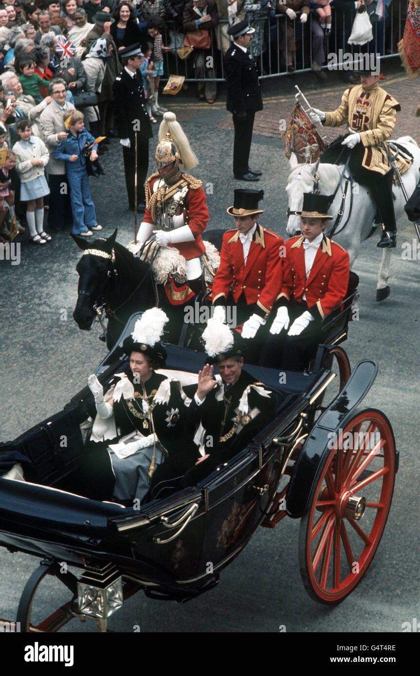 Queen Elizabeth II and the Duke of Edinburgh travel in a carriage ...