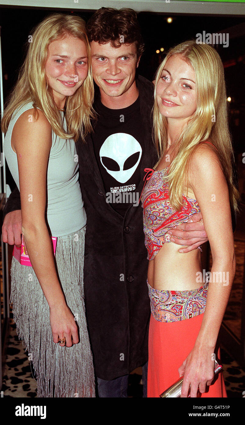 Model sisters Jodie (left) and Jemma Kidd, with their brother arriving ...