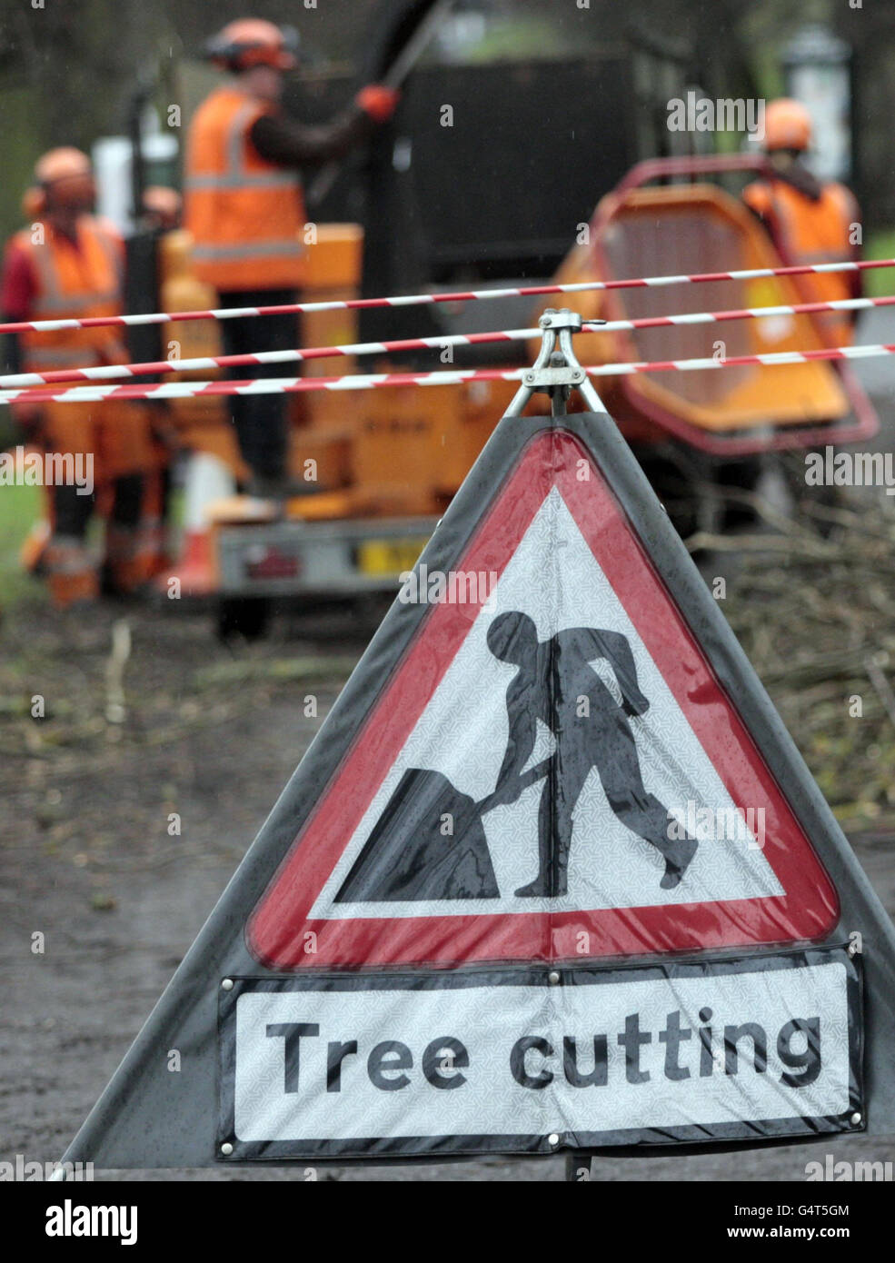 Workers clear away fallen trees in the centre of Edinburgh after fierce ...