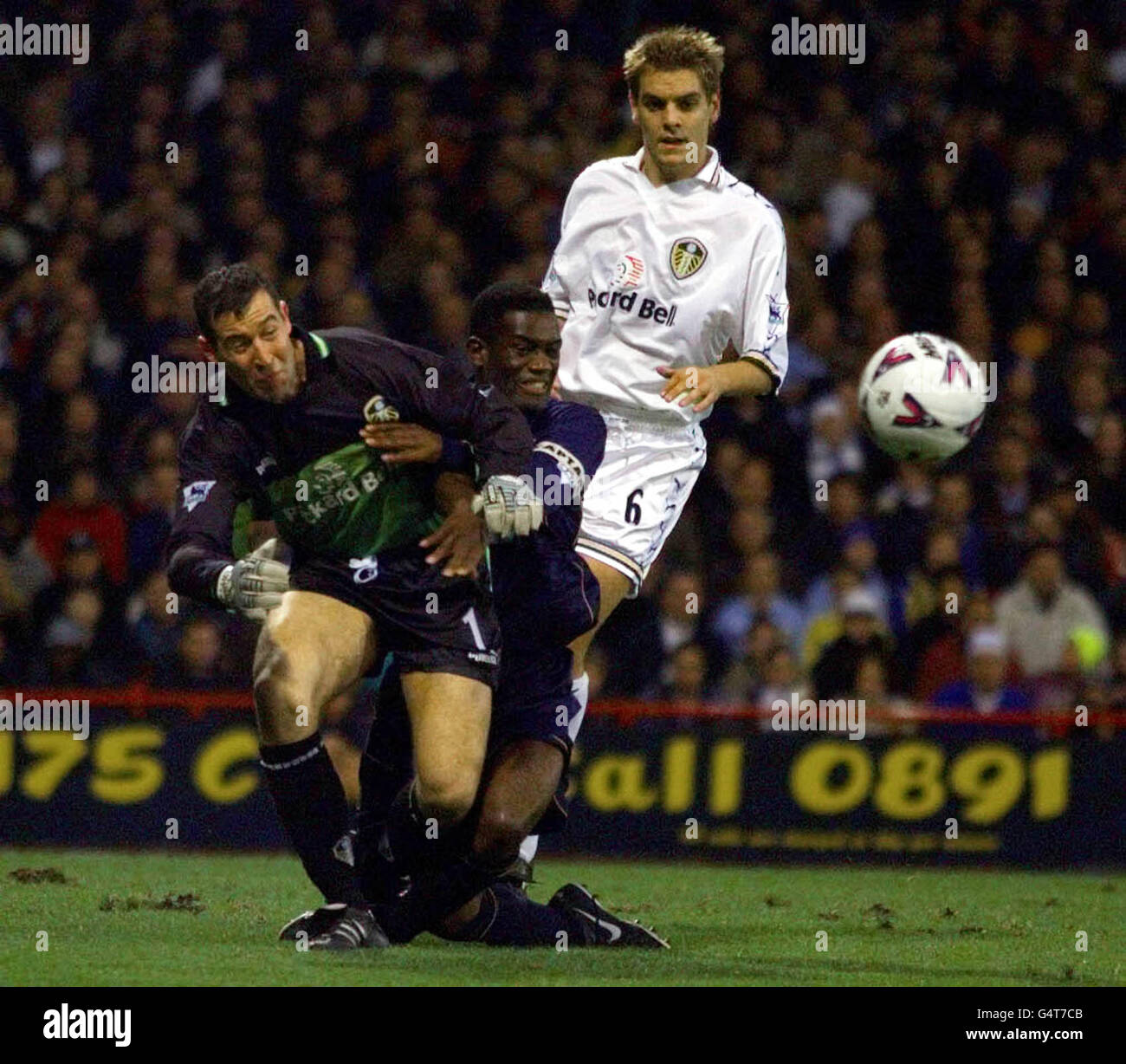 Leeds United 's goalkeeper Nigel Martyn (L) and Wimbledon 's Robbie ...