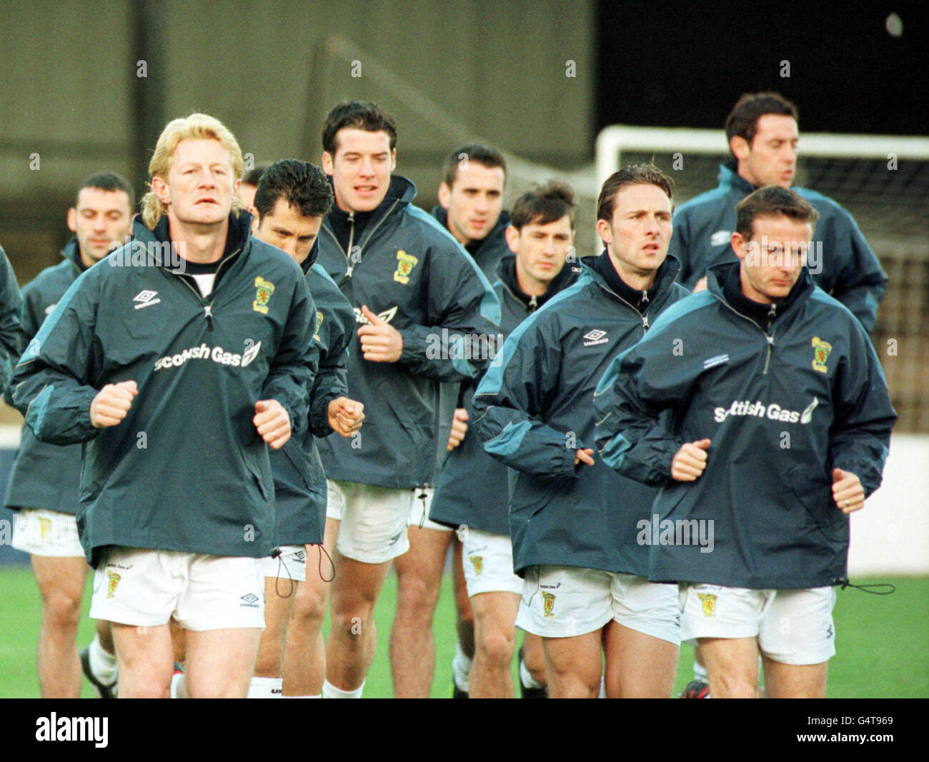 Colin Hendry (left) runs out at Ayr during training with the Scotland ...