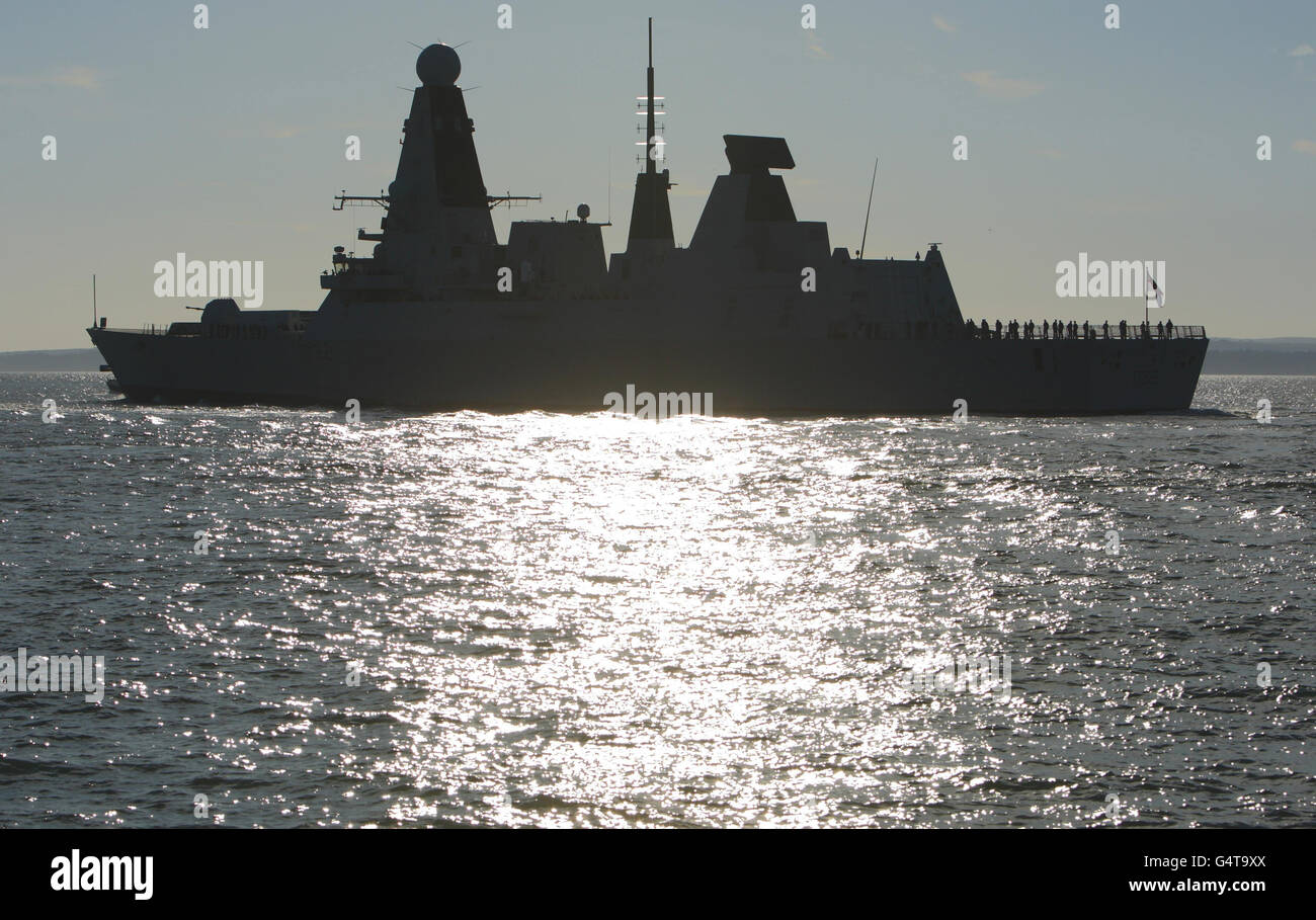 Type 45 Destroyer HMS Daring leaves Portsmouth Harbour as the Royal ...