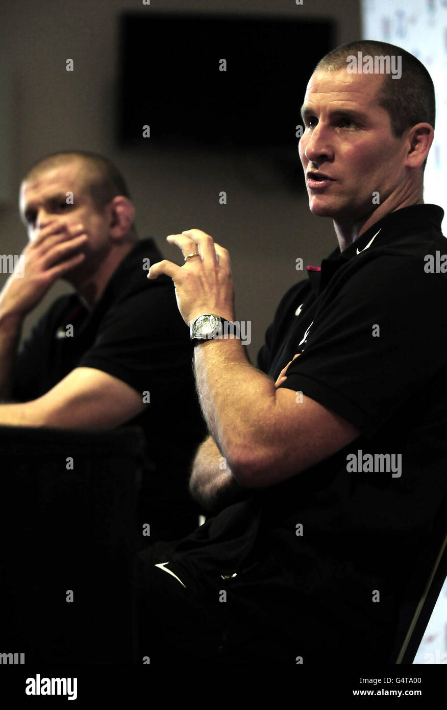 England coach Stuart Lancaster (right) and Graham Rowntree talk to the ...