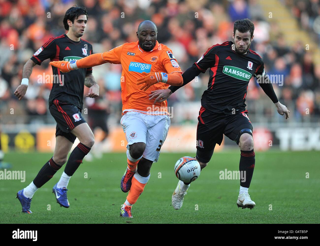 Blackpool's Lomana Tresor LuaLua and Middlesbrough's Matthew Bates ...