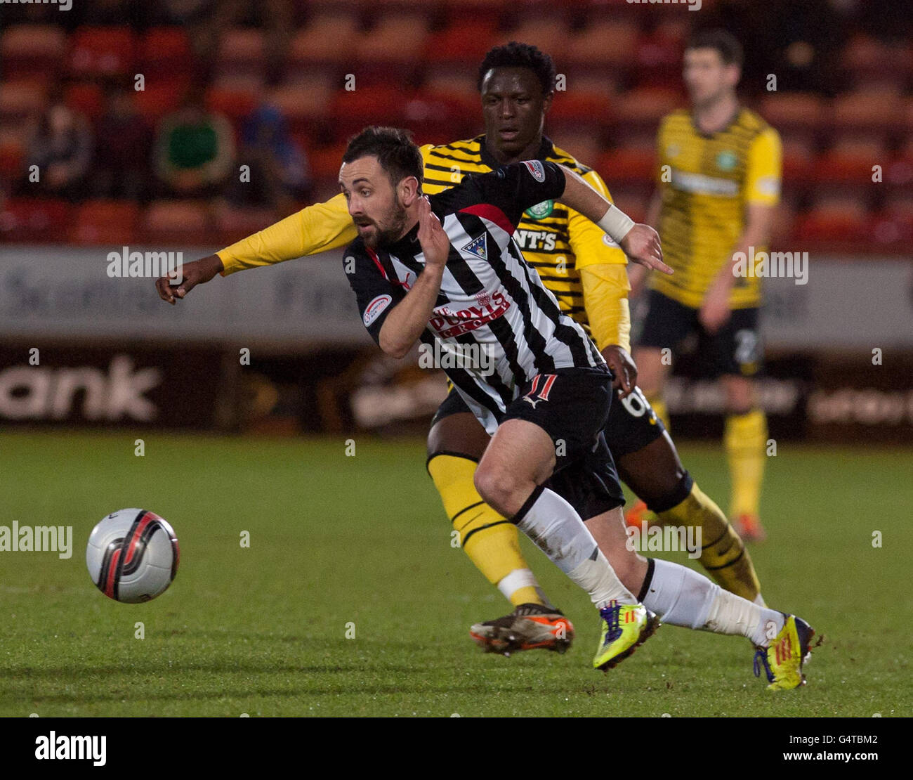 Dunfermline's David Graham takes the ball away from Celtic's Victor ...