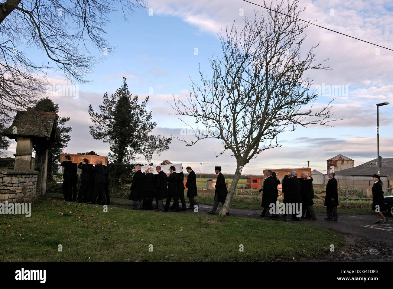 The Coffins of Toby, Samantha and Genevieve Day arrive at St Peter and ...