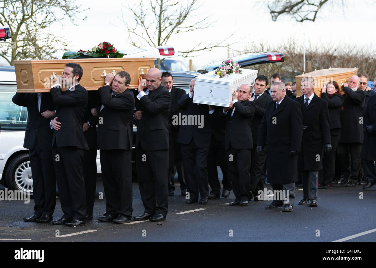 The coffins of Toby, Samantha and Genevieve Day arrive at St Peter and ...
