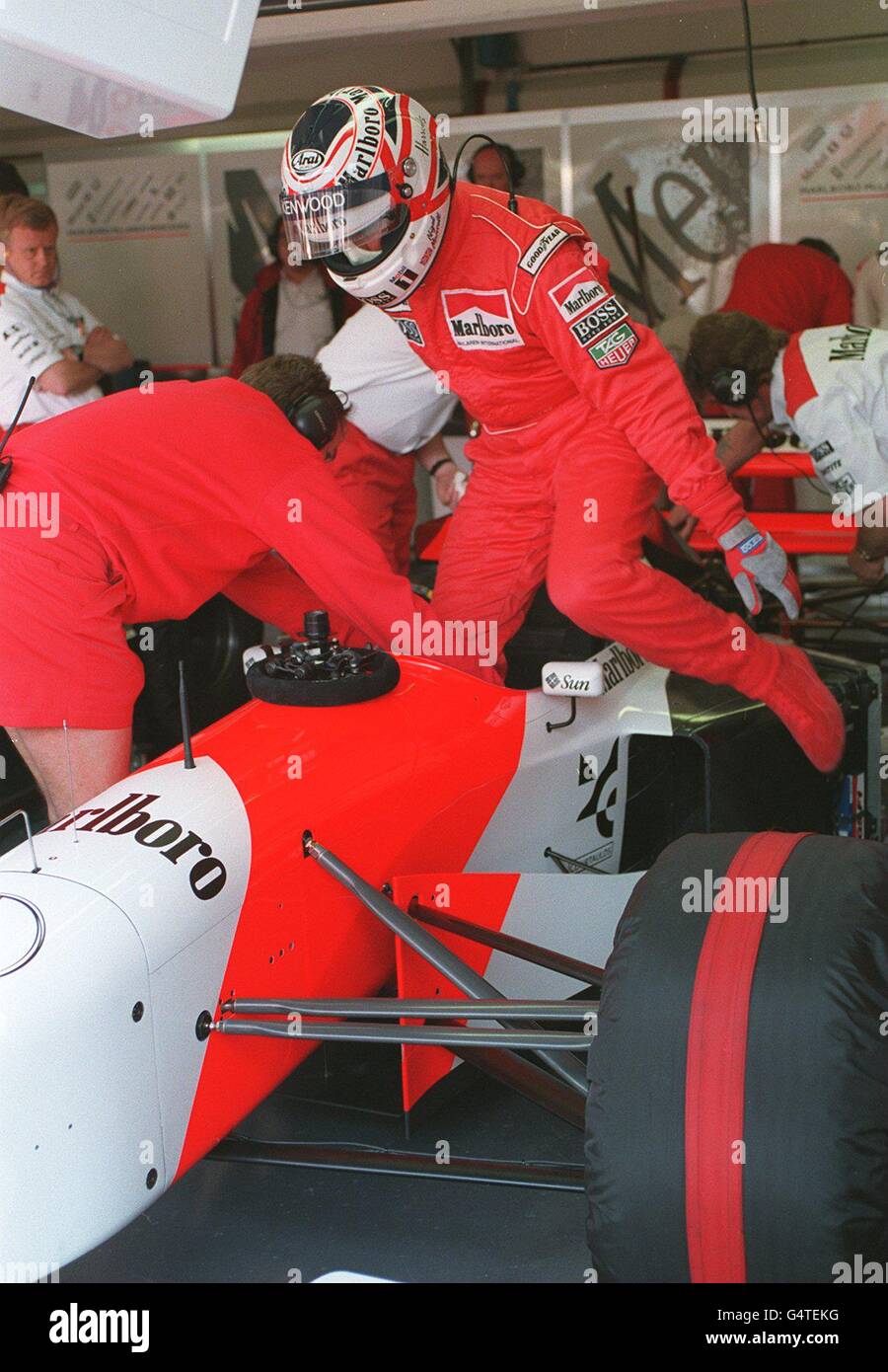 Nigel mansell climbs into new redesigned car hi-res stock photography ...