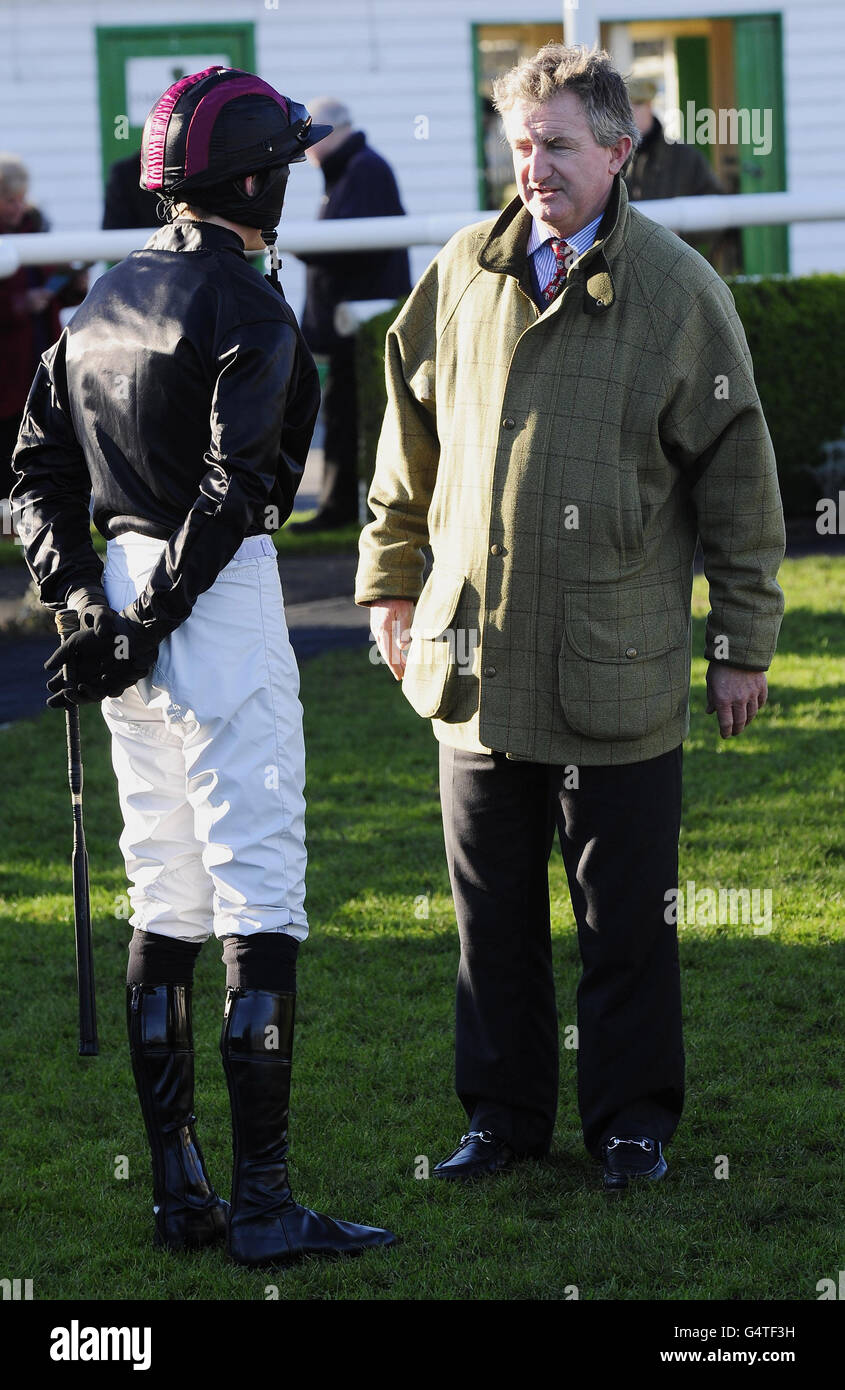 Racehorse trainer John Ferguson talks to jockey Jack Quinlan who rode ...