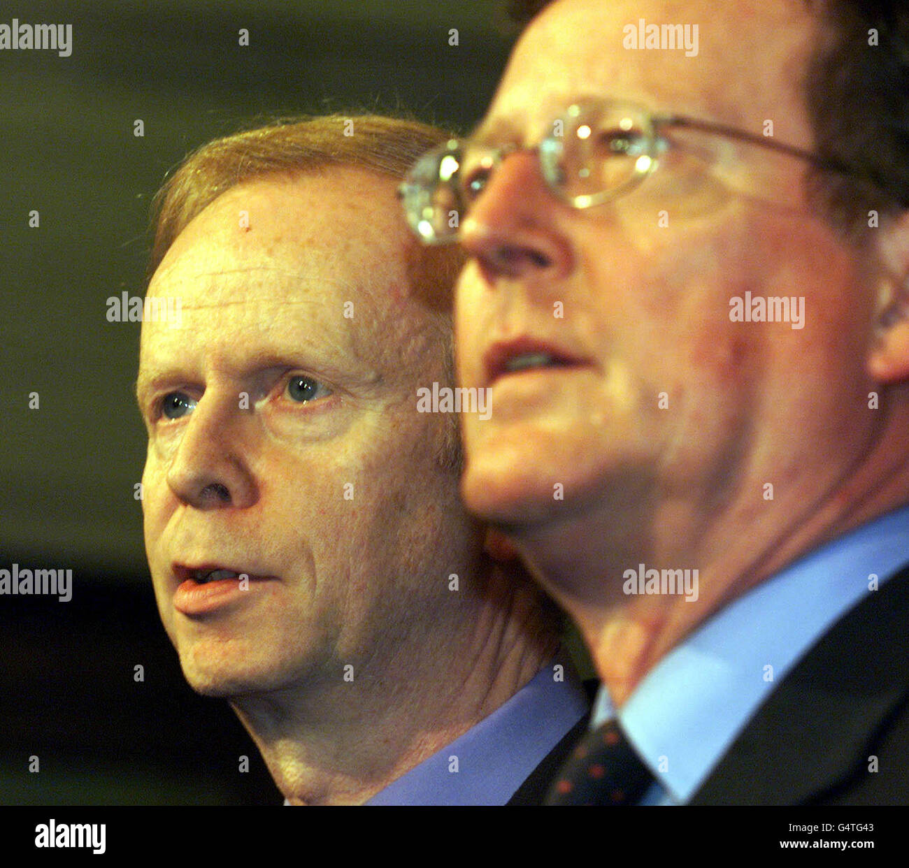 First Minister David Trimble (right) introduces Sir Reg Empey one of ...