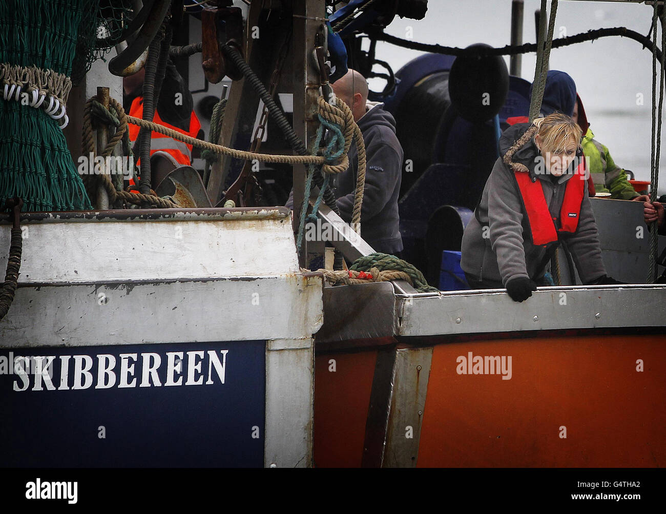 Missing trawlerman Kevin Kershaw's mother Margaret (right) at the stern ...