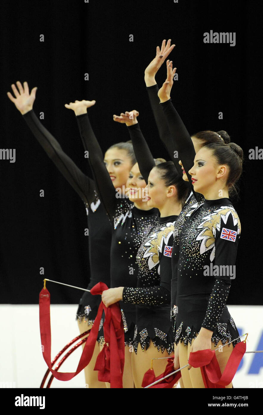 Great Britain wave following their performance during the group section ...