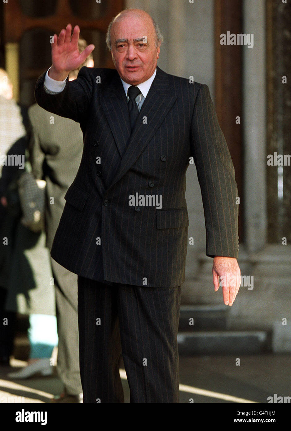 Harrods owner Mohamed Al Fayed arriving at the High Court in central ...