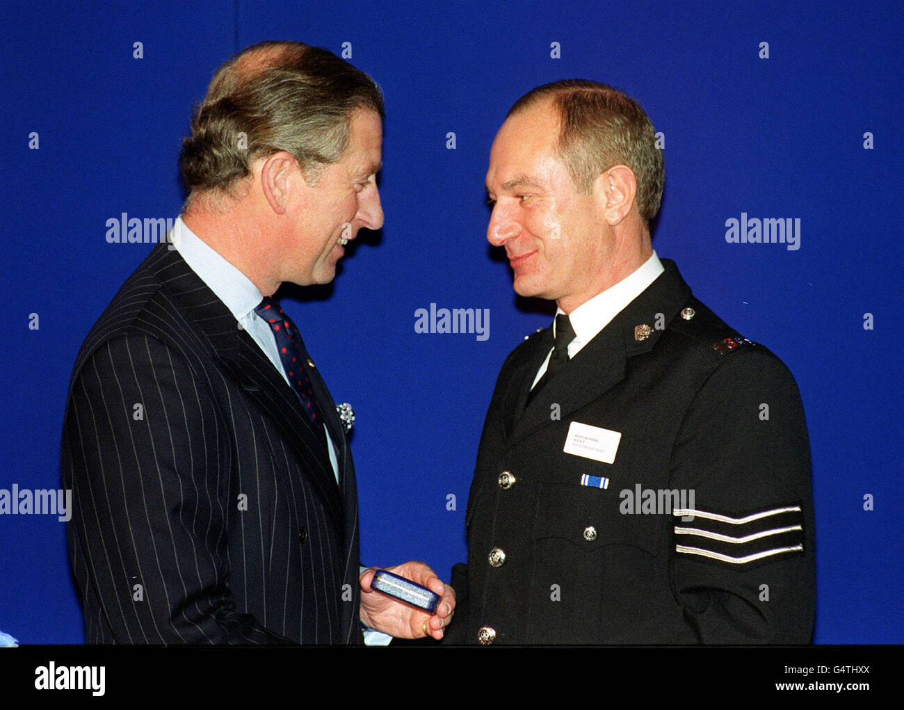 The Prince of Wales presents Police Sergeant Peter Shepherd with the ...