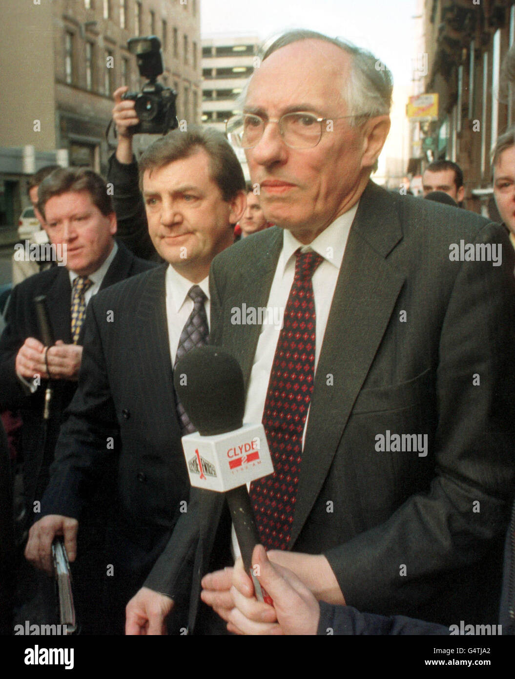 Scottish First Minister Donald Dewar and spokesman David Whitton ...