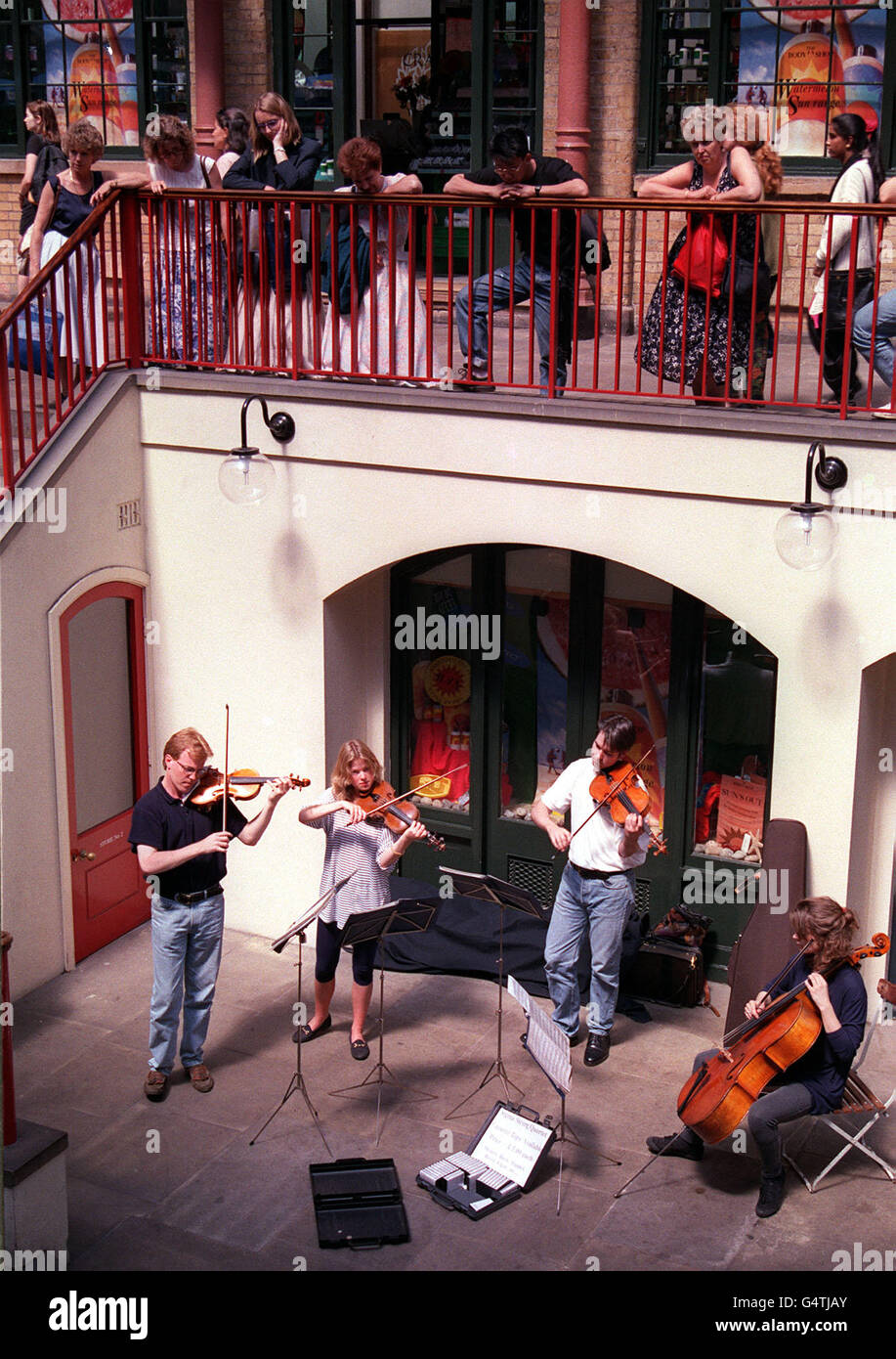 String quartet entertain shoppers tourists in londons covent garden hi ...