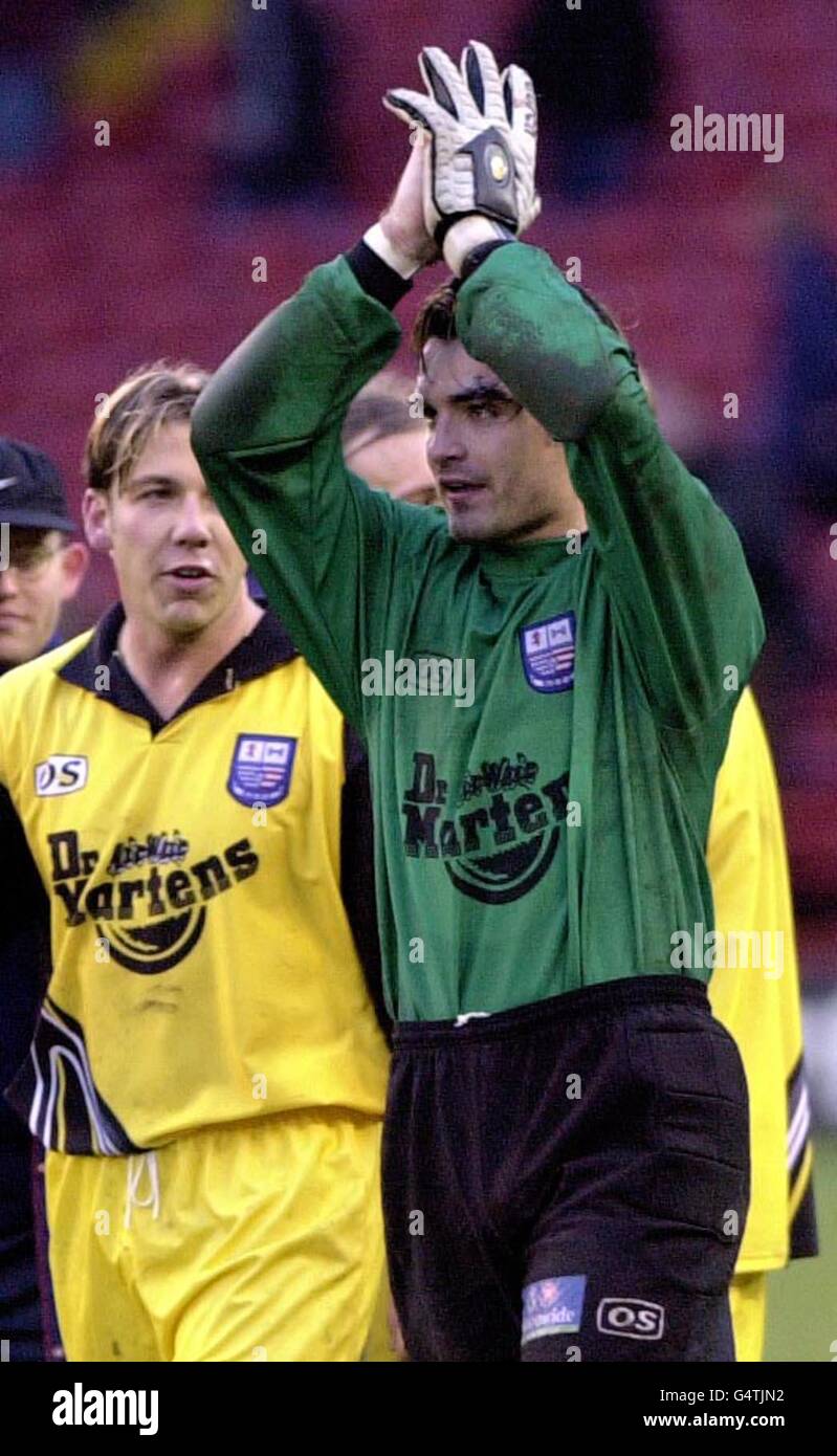 Rushden and Diamonds goalkeeper Billy Turley walks off the pitch to ...