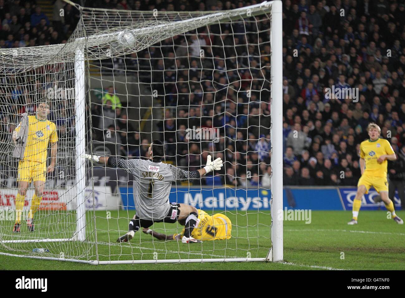 Crystal Palace goalkeeper Julian Speroni (centre left) watches as a ...