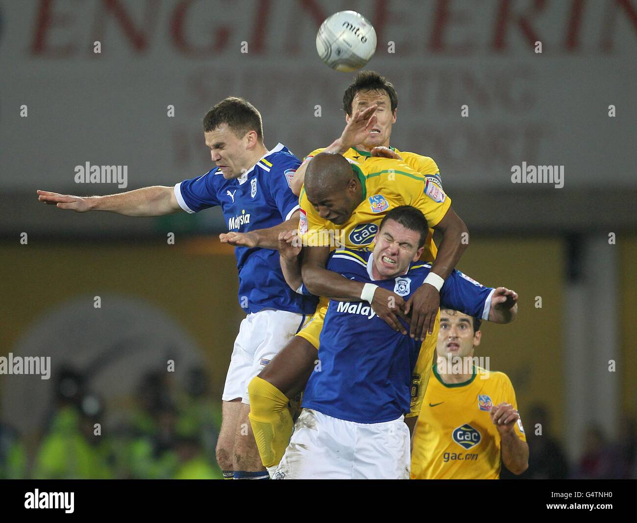 Cardiff City's Anthony Gerrard (centre below) and Ben Turner (left ...