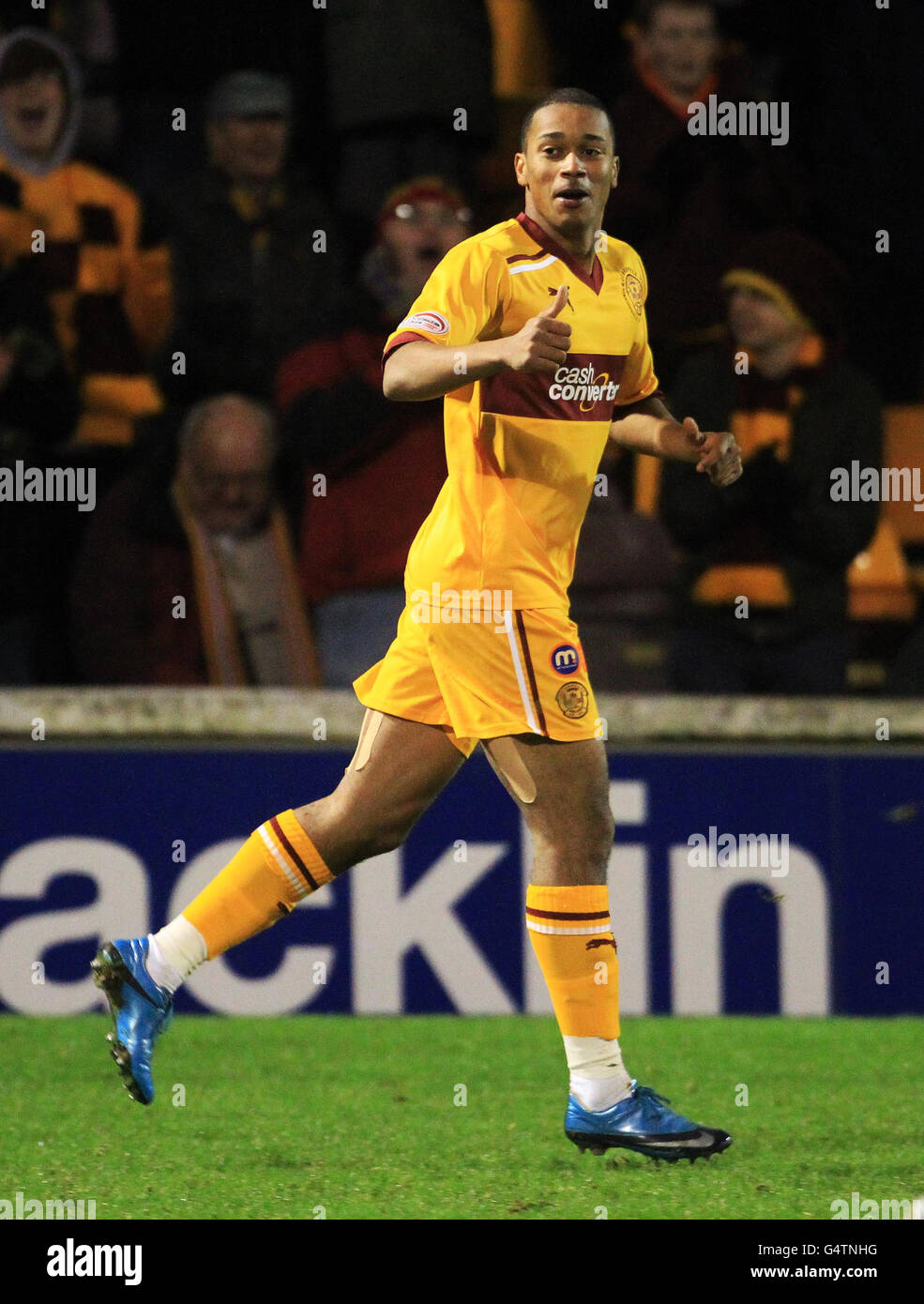 Motherwell's Chris Humphrey celebrates scoring his sides third goal ...