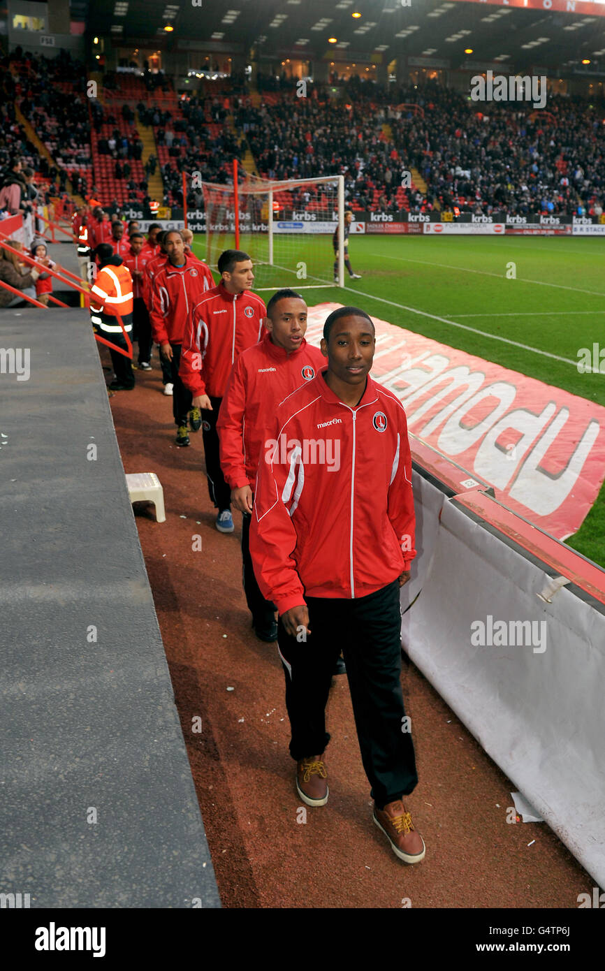 Kids walk around the pitch prior to the match as part of the Academy ...