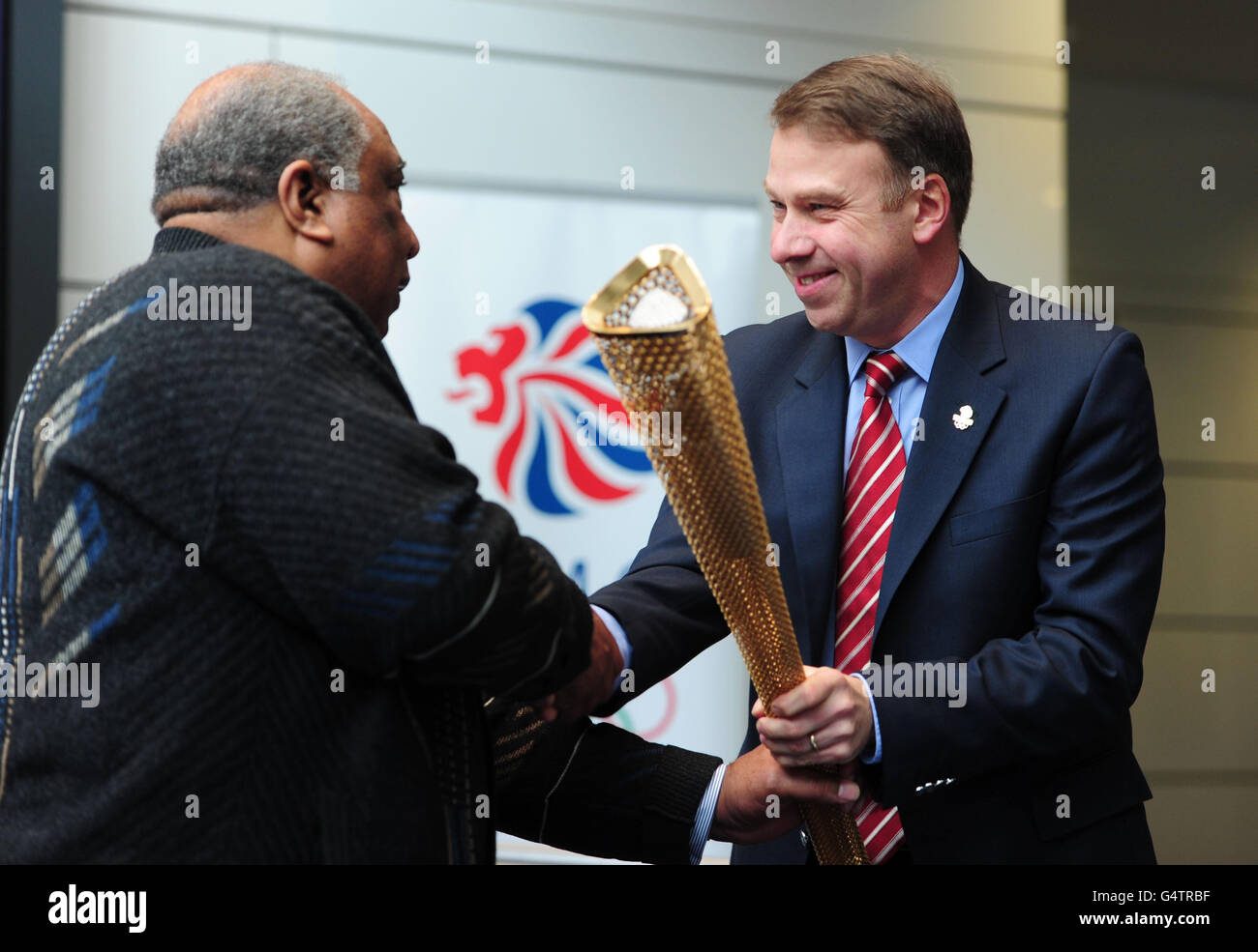 Andy Hunt Team GB Chef de Mission and BOA CEO (right) hands over the ...