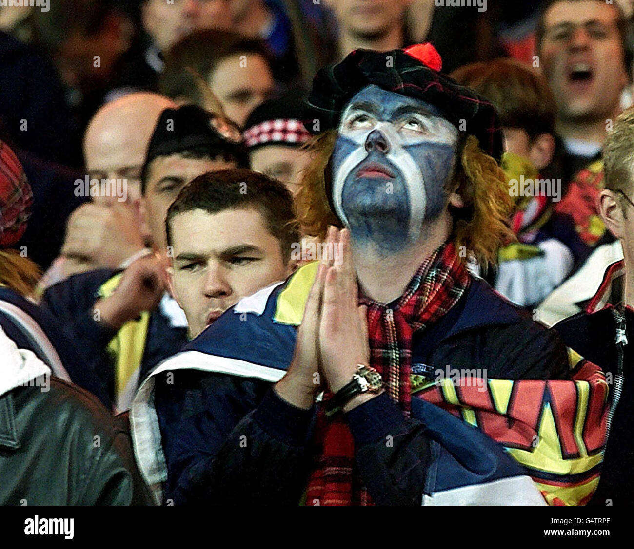 Sport fan praying hi-res stock photography and images - Alamy