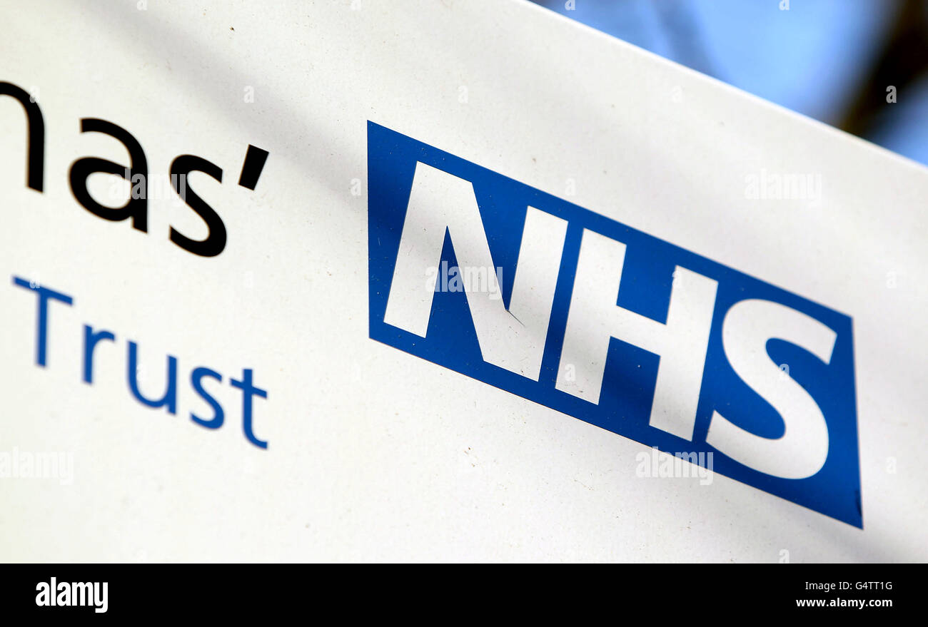 An NHS sign at St Thomas' Hospital in Westminster, central London Stock ...