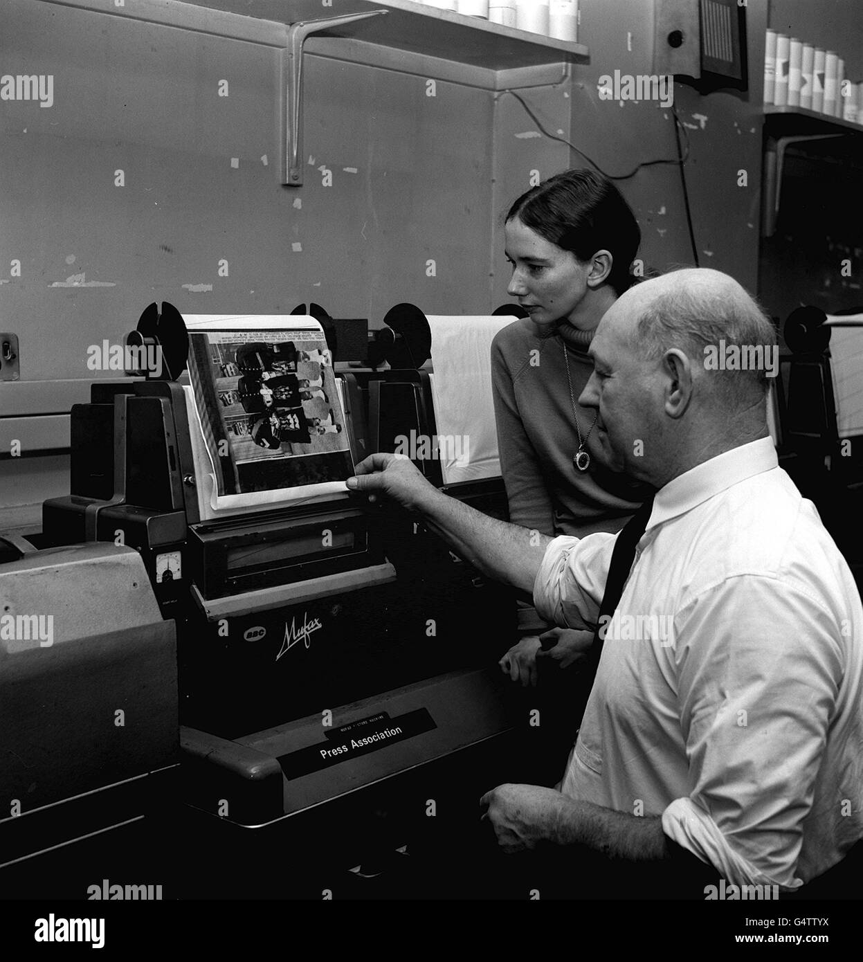 Picture receivers at work in the photo wire room at the BBC Television ...