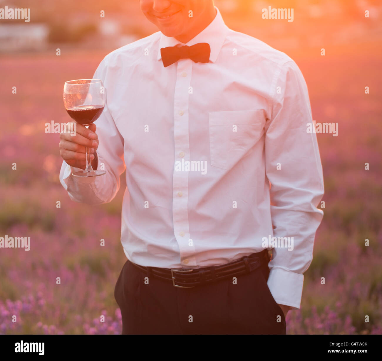 Man tasting red wine backlight hi-res stock photography and images - Alamy