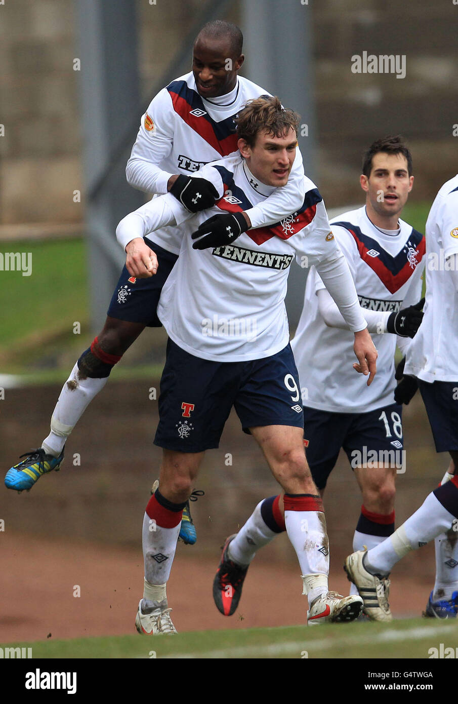 Rangers Nikica Jelavic (left) celebrates scoring his sides second goal ...