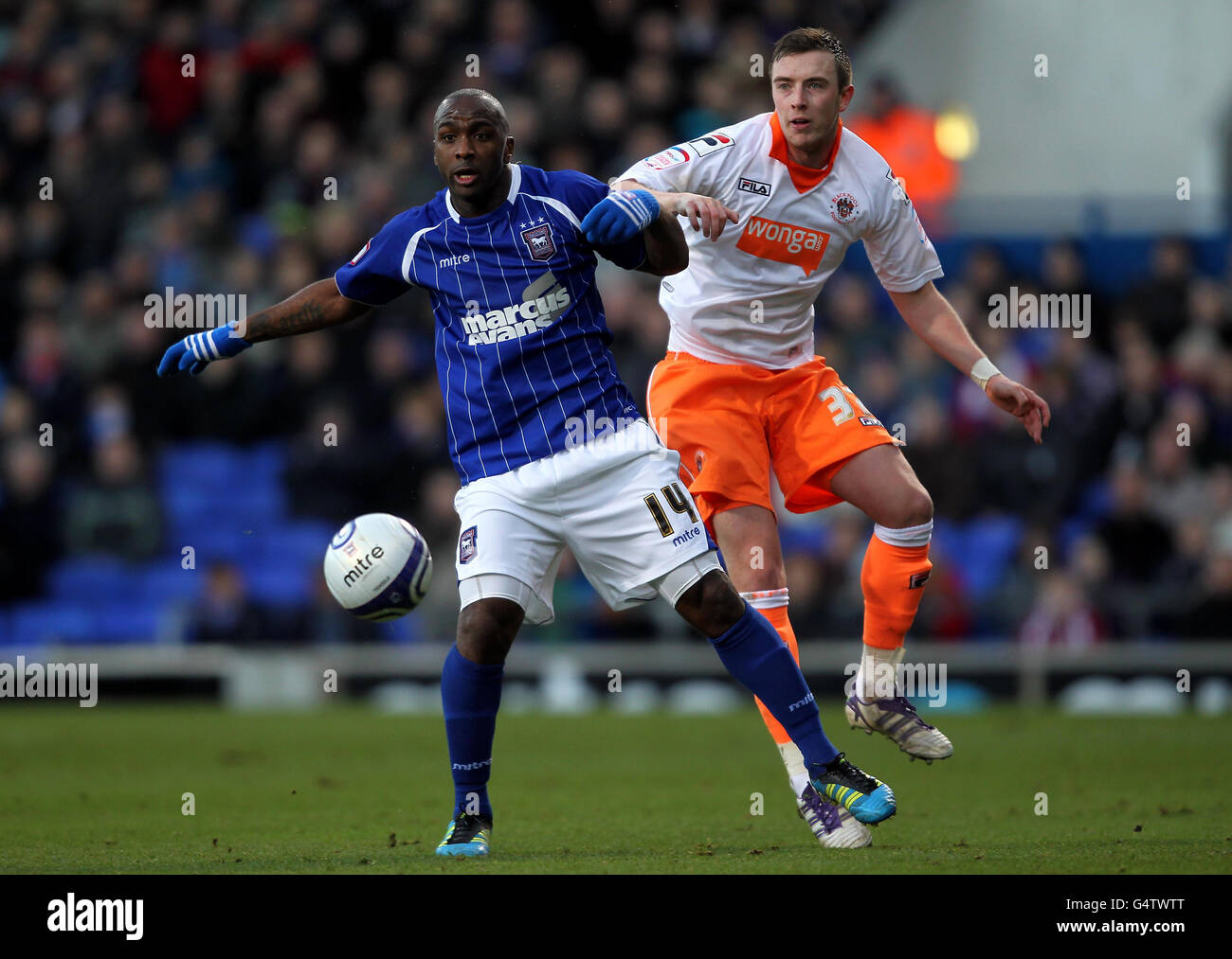 Ipswich Town's Jason Scotland and Blackpool's Danny Wilson (right ...