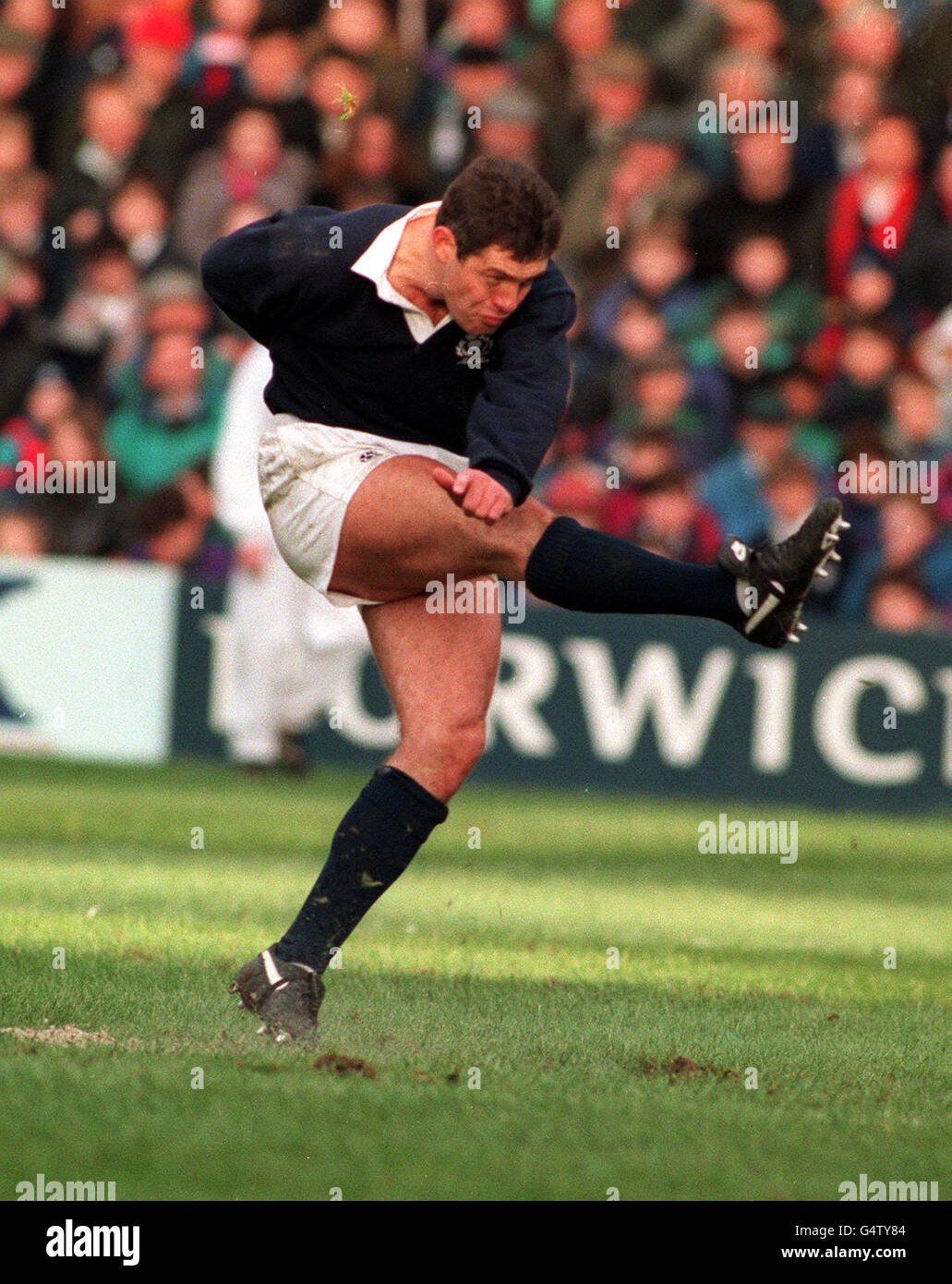 Scottish Captain Gavin Hastings kicks upfield during the Five nations ...