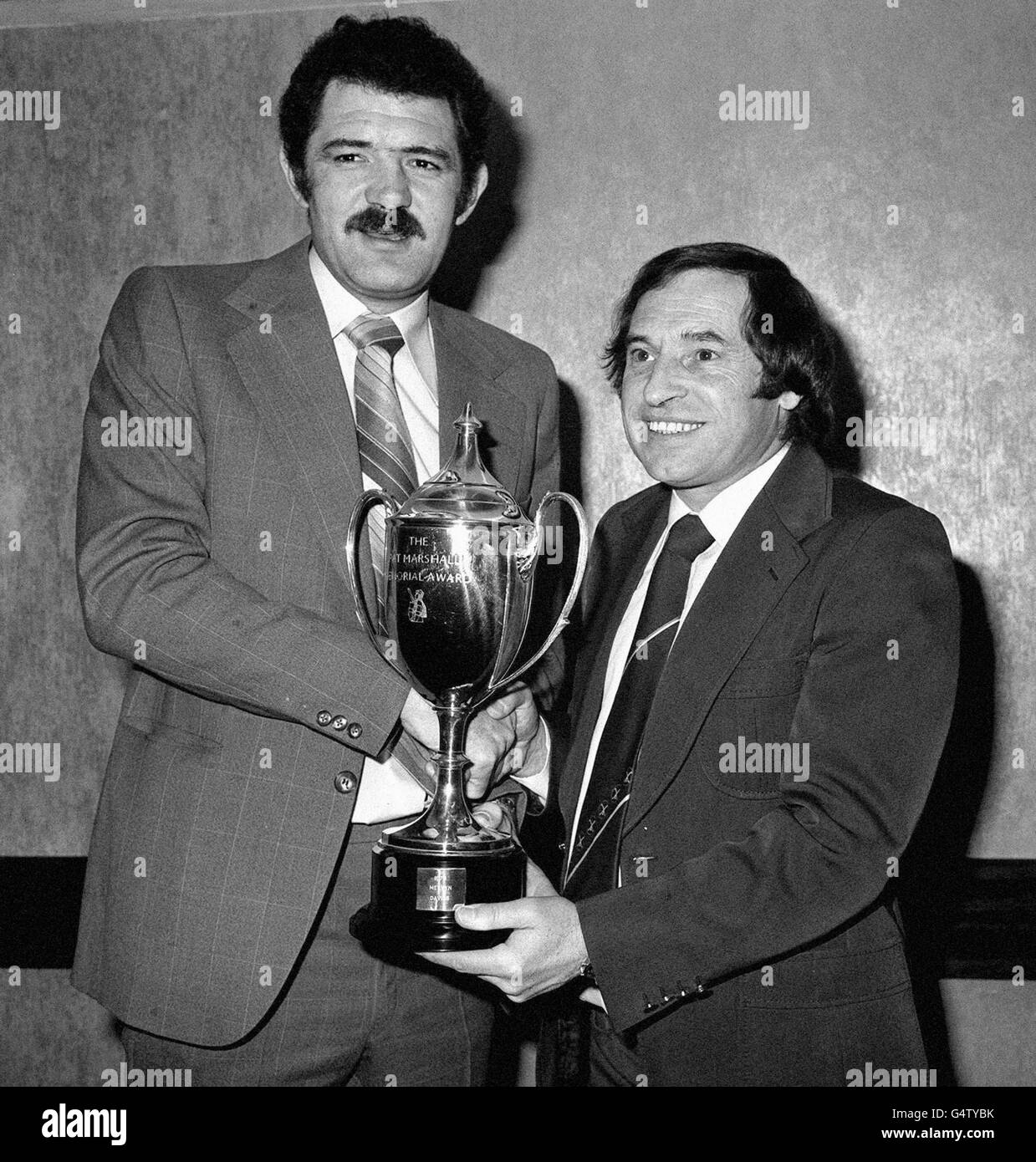 Former Welsh and British Lions rugby player Mervyn Davis (L) with ...