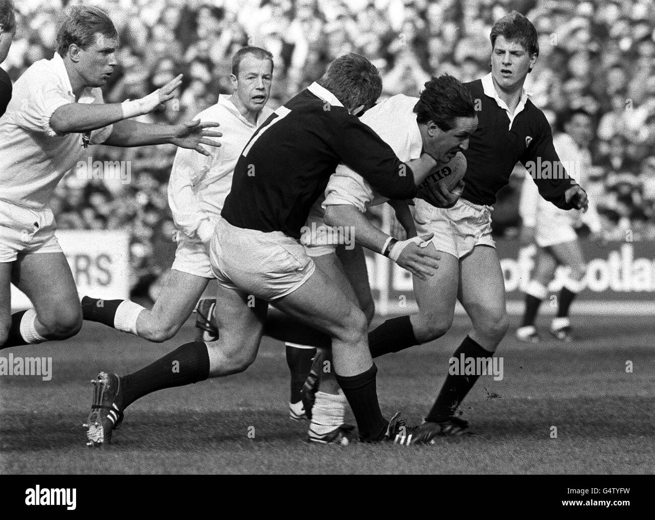 Scotland 's Finlay Calder tackles England 's Mike Teague during the ...