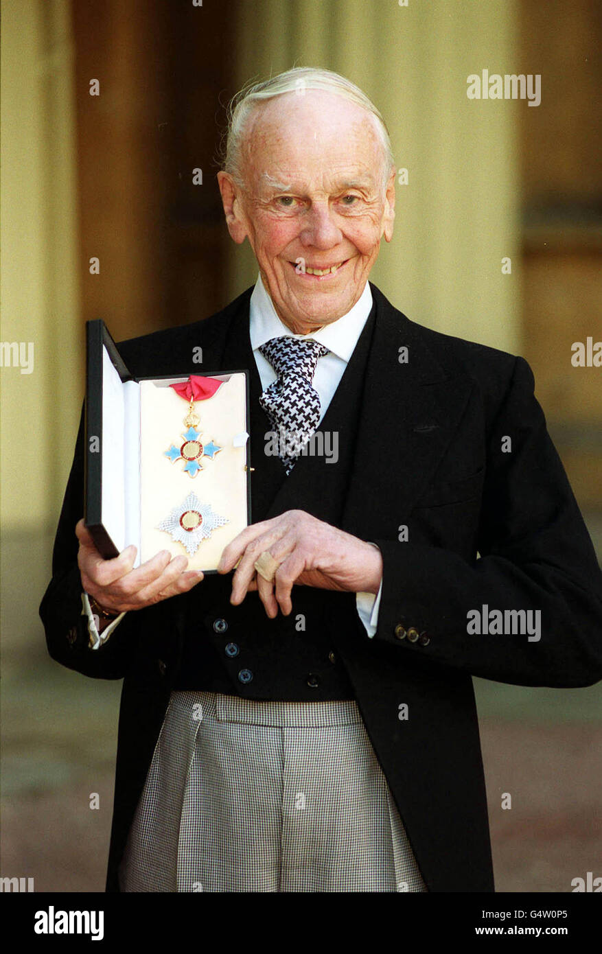 Received a knighthood from the queen at buckingham palace hi-res stock ...