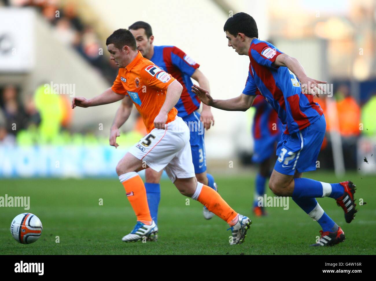 Blackpool's John Fleck during the game against Crystal Palaces' John ...