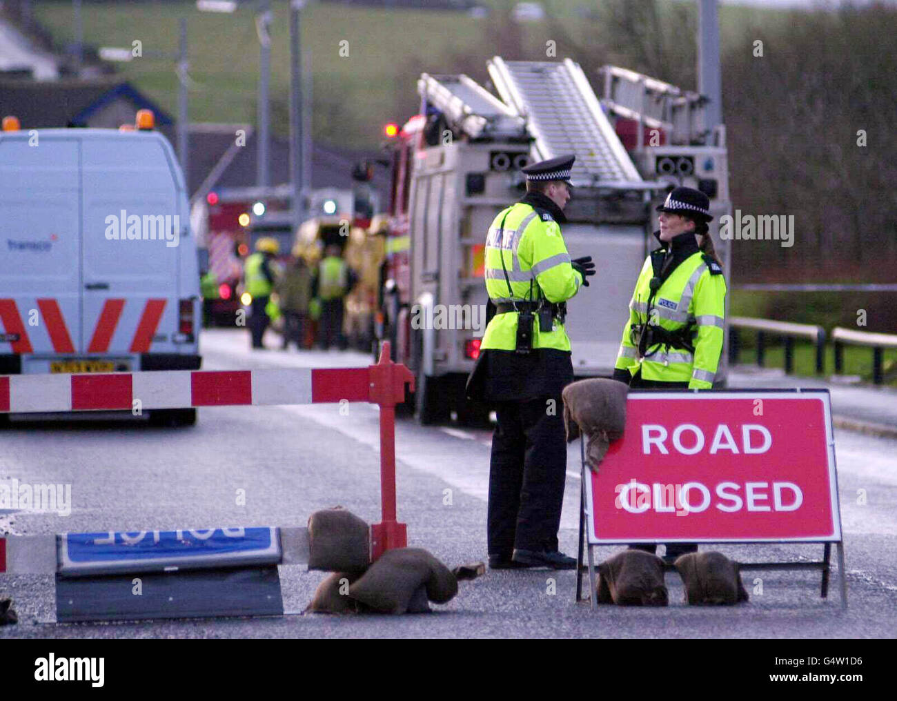 Police officer's patrol the road block which stands at the end Carlisle ...