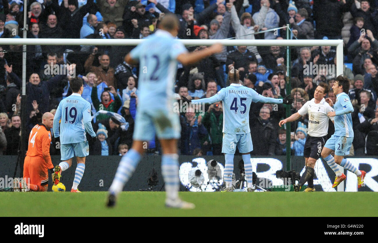 Manchester City's Mario Balotelli celebrates scoring his sides third ...