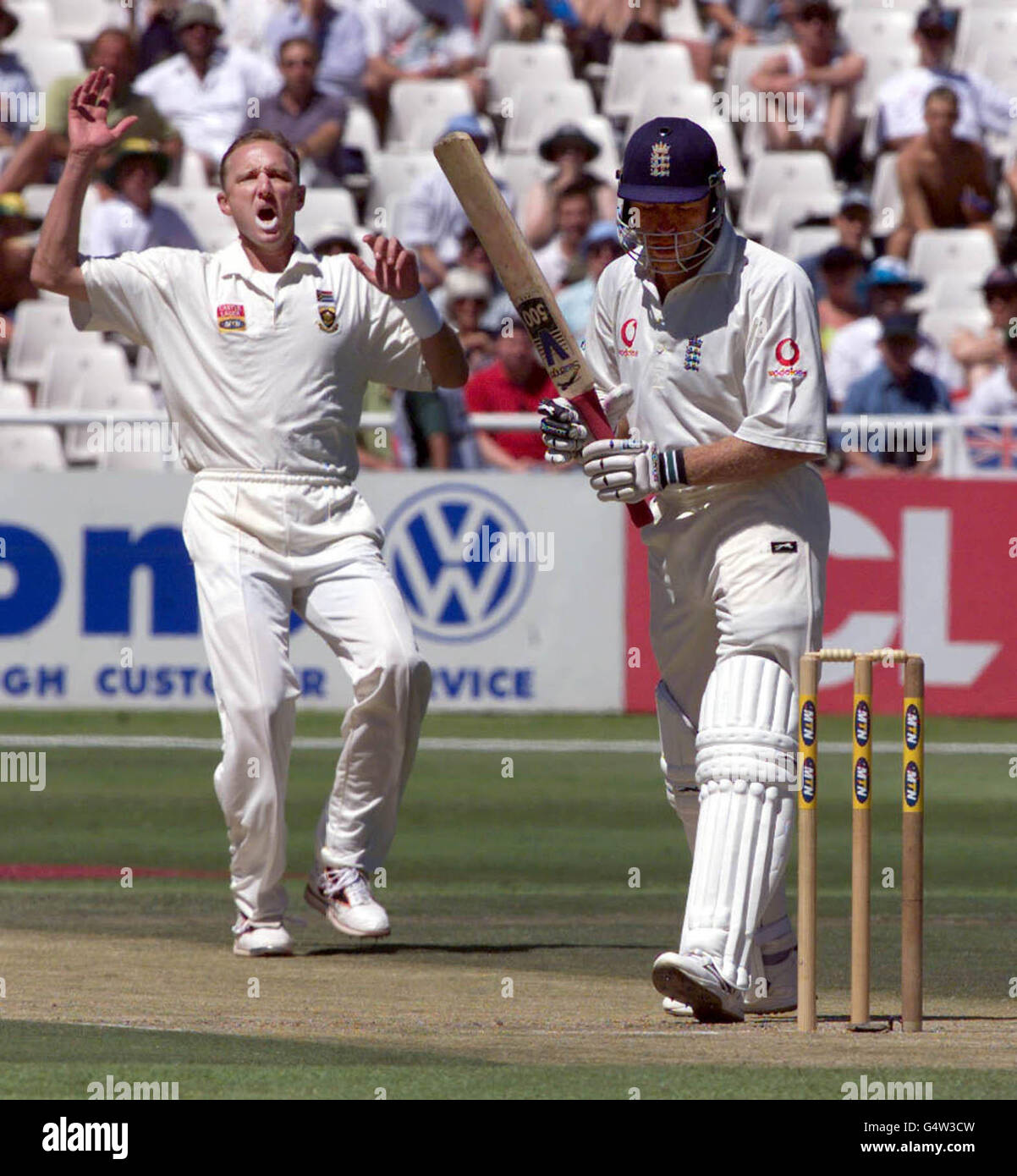 South Africa's Allan Donald reacts to a bad shot played by Chris Adams ...