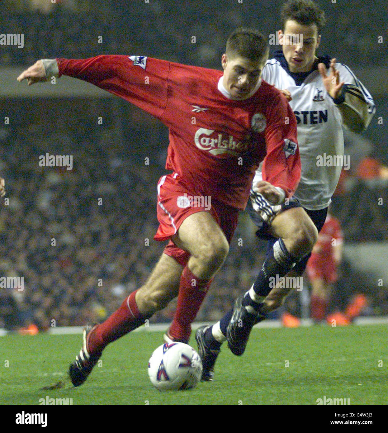 Liverpool's Teven gerrard and Tottenham Hotspur's Stephen Carr fight ...