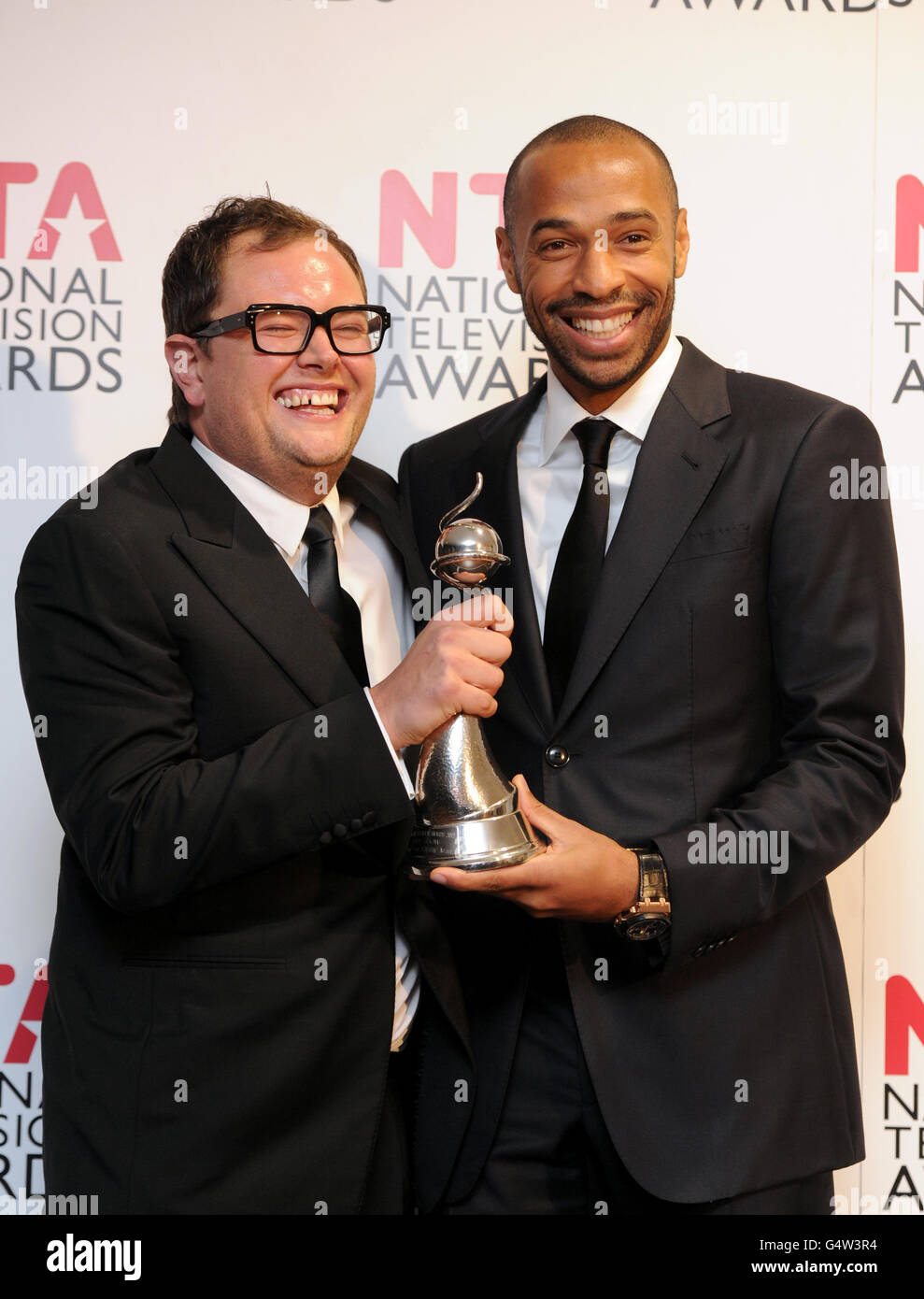 standsjests with Alan Carr winner of the Talk Show award for Chatty Man ...