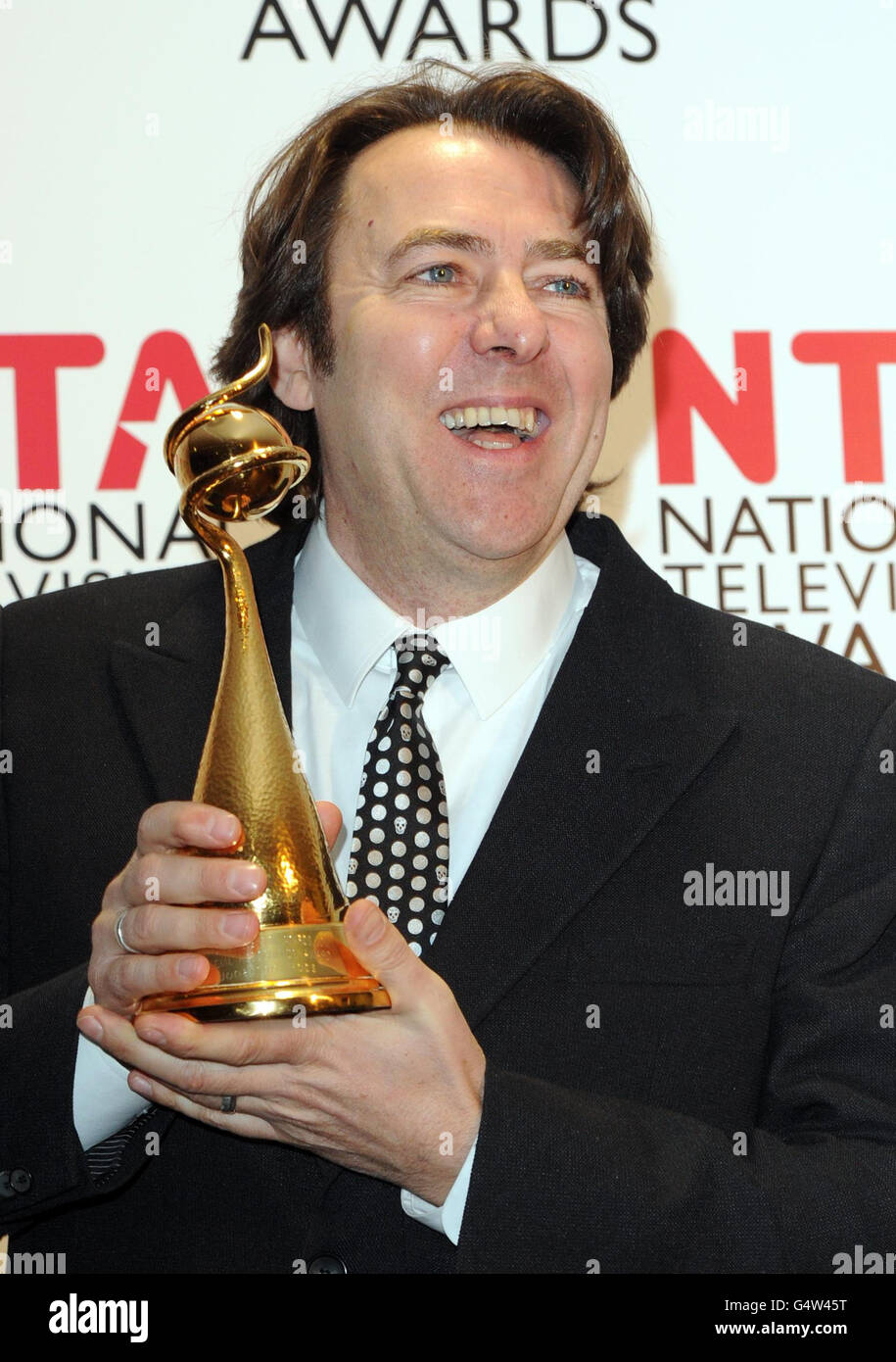 Jonathan Ross, holds his Special Recognition Award, backstage at the ...