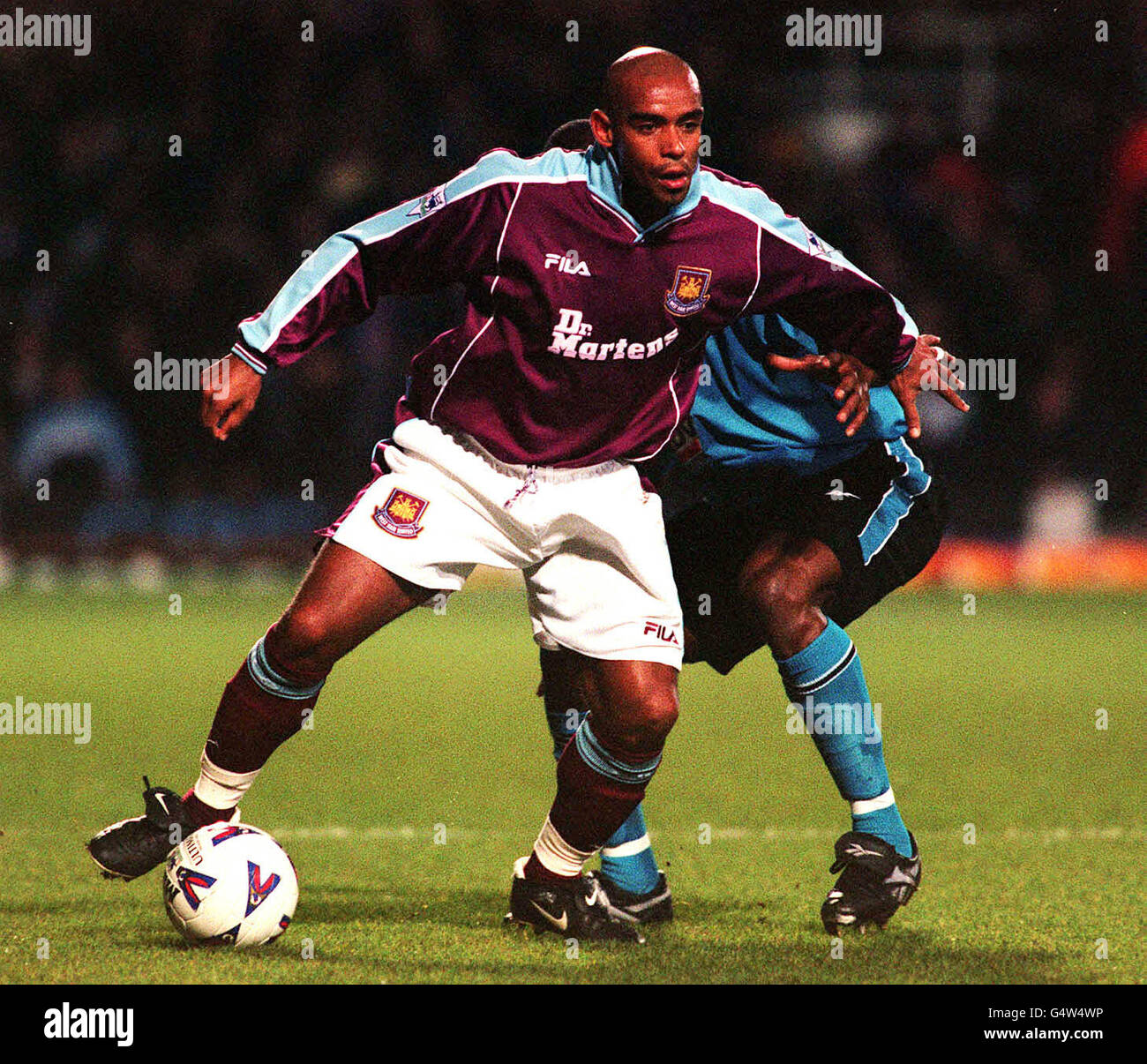 Sport football action tackling kicking trevor sinclair hi-res stock ...