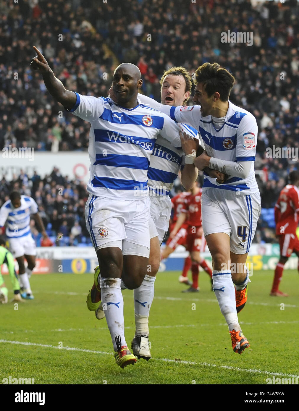 Reading's Jason Roberts (left) celebrates scoring his side's first goal ...