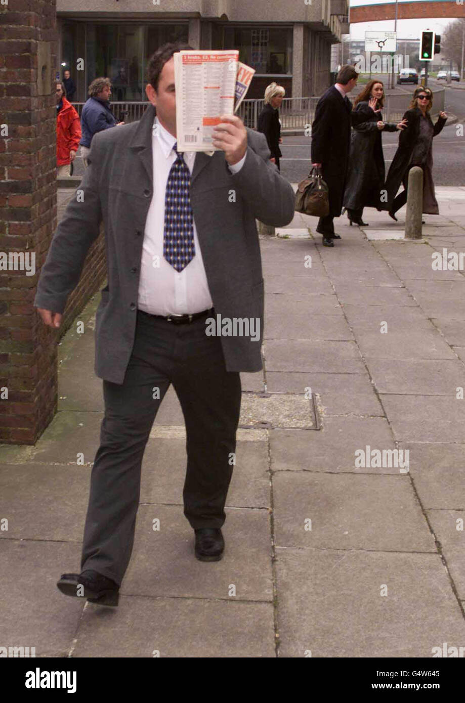 Court case hiding face hi-res stock photography and images - Alamy
