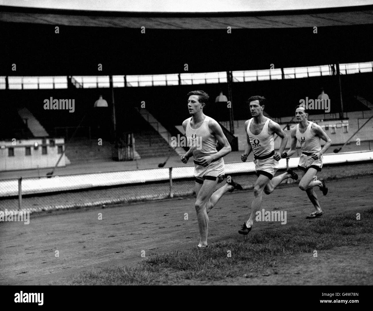 Roger Bannister (front) during a training session at the White City ...